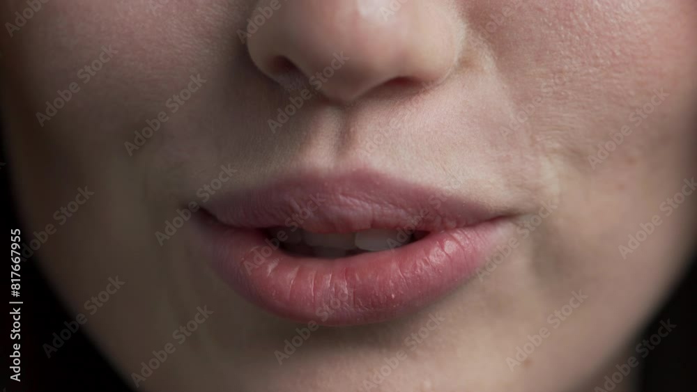 Cropped view lower part of pretty young woman face speaking talking ...