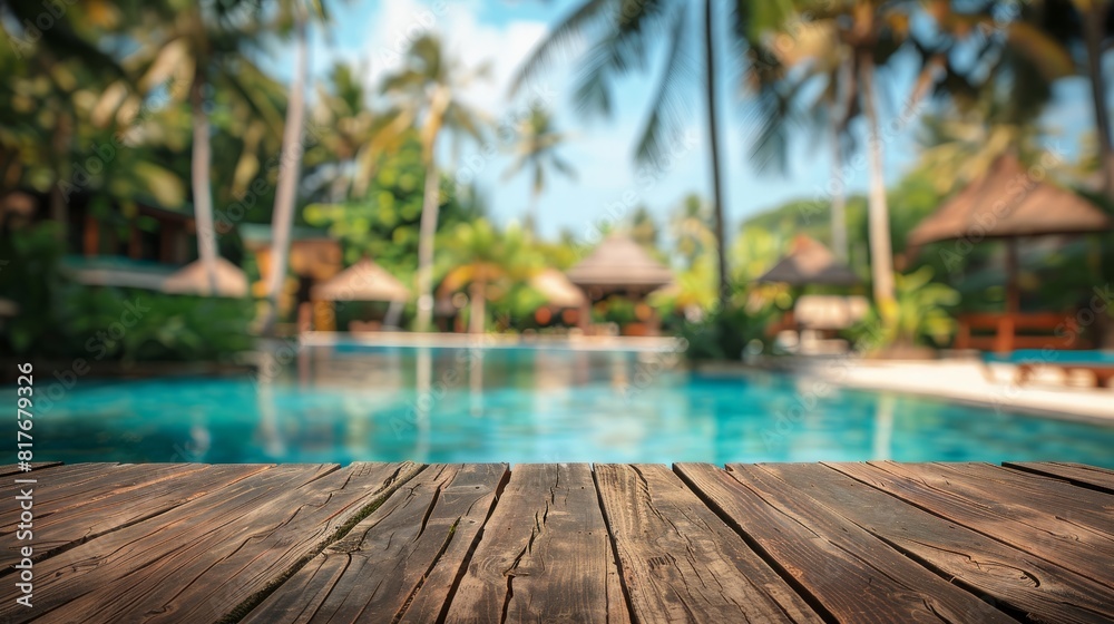 Image of wood table in front of swimming pool blur background. Brown ...