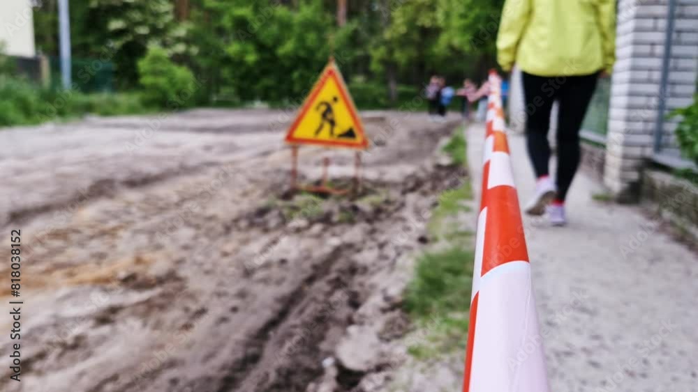Some signs signage for work in progress on urban street. Barriers and ...