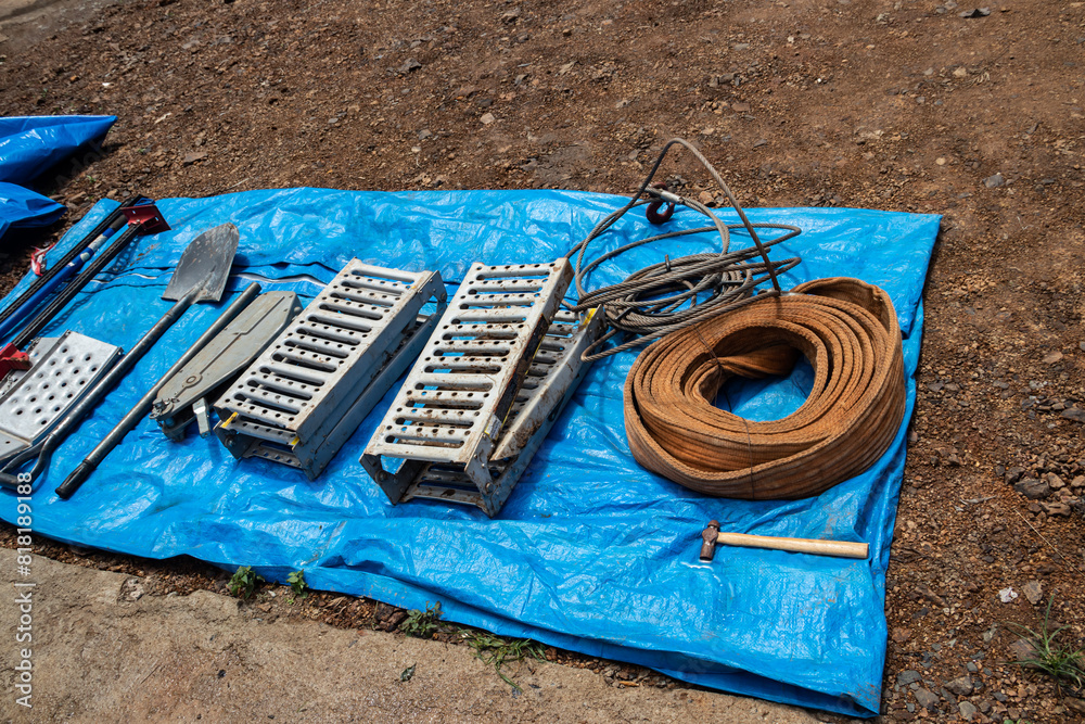 Recovery equipment for unstacking 4x4 vehicle out of muddy road, sand ...