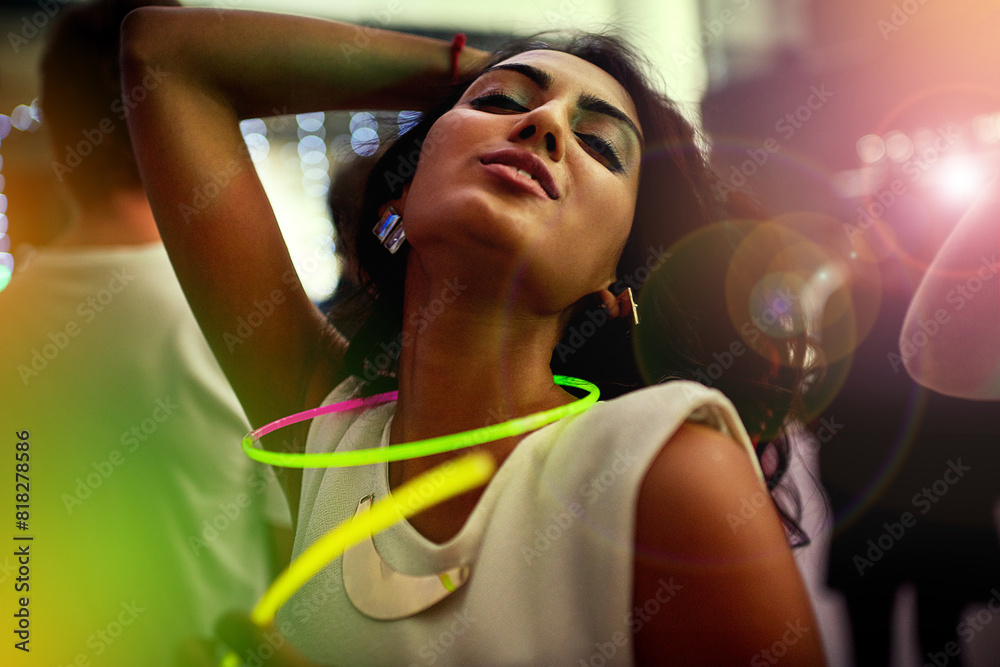 Dancing, lights and woman in nightclub for fun, music or happy weekend ...