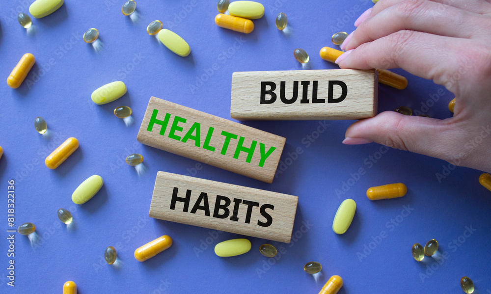 Healthy habits symbol. Concept word Build Healthy habits on wooden ...