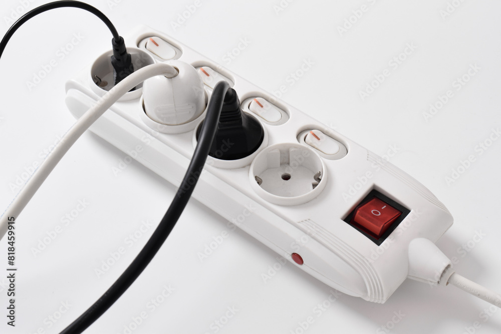 Electrical plug in outlet socket at home isolated on white background ...