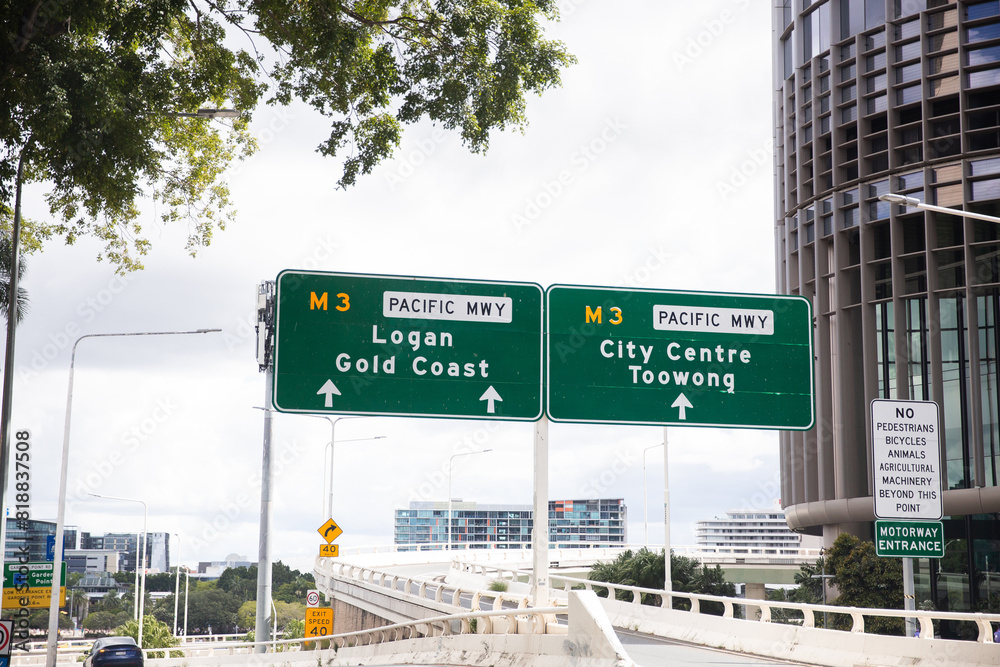 road signs and ramps onto the riverside expressway Stock Photo | Adobe ...