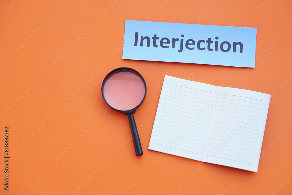 Paper word card with text "Interjection", magnifying glass and blank ...