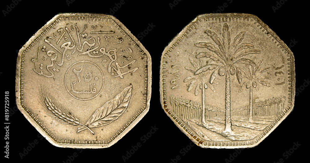Vintage Libyan Jamahiriya dinar coins placed on a vibrant black ...