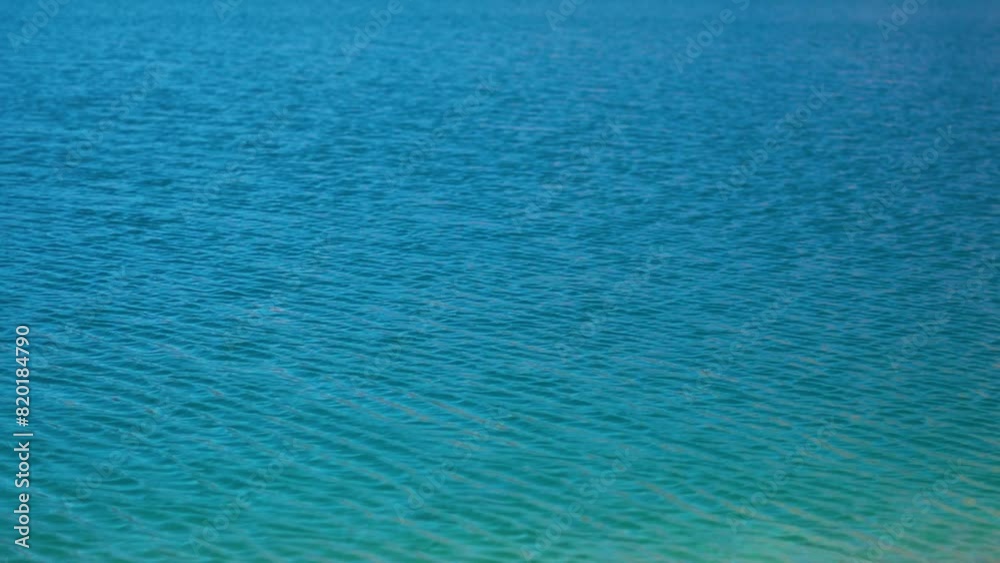 Slow motion shot of water ripples on the Chandra Taal Lake near Kunzum ...