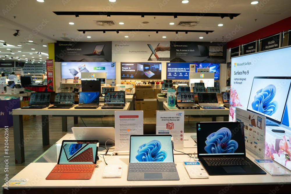 KUALA LUMPUR, MALAYSIA - MARCH 12, 2023: laptops on display at All IT ...