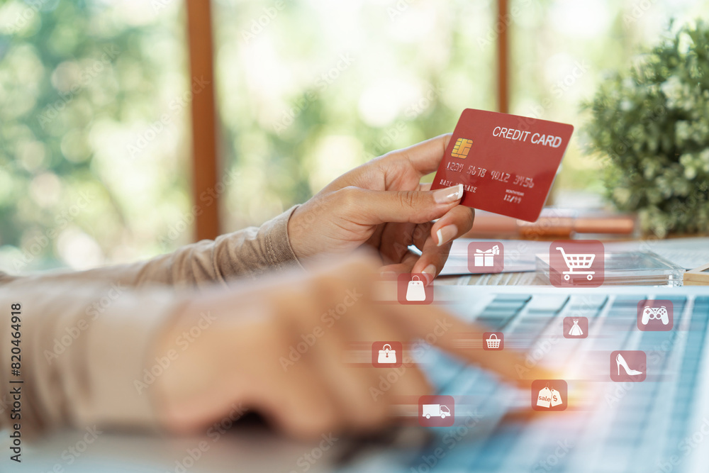 Elegant customer hold credit card with hologram interface choose online ...