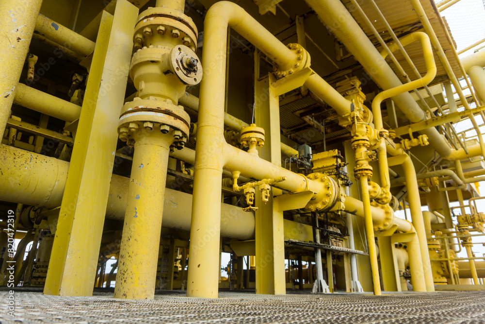 Oil and gas processing plant with pipe line valves.Steel pipelines and ...