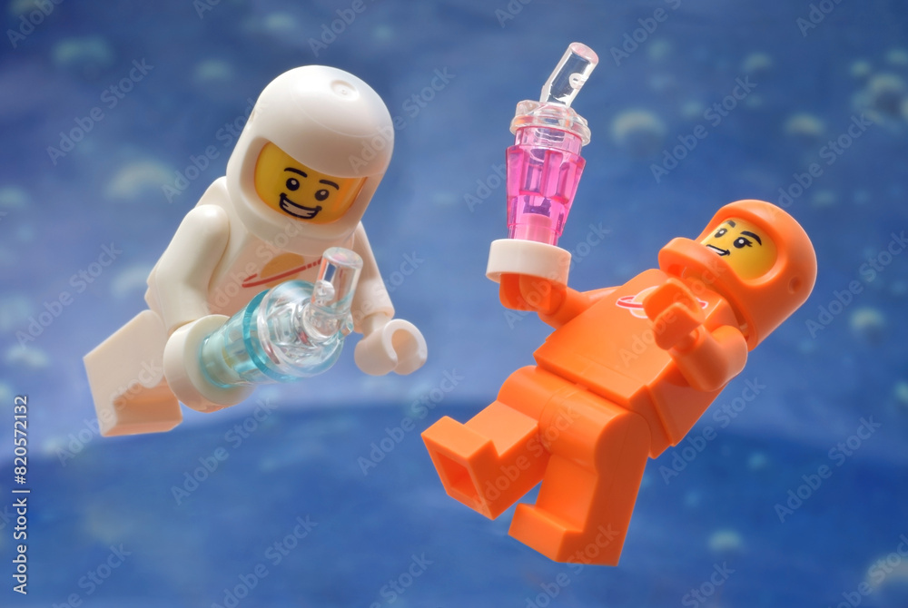 Lego minifigure of two astronauts in space suits in Galaxy. Editorial ...