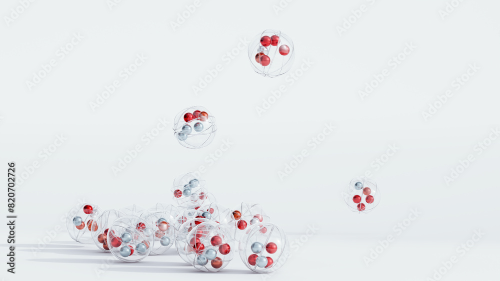 Transparent spheres with red and silver balls inside on a white ...