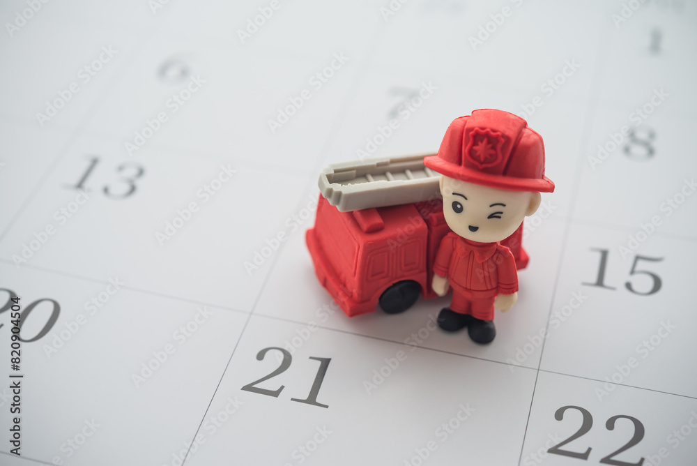 Firefighter and fire truck on calendar background copy space. Concept ...