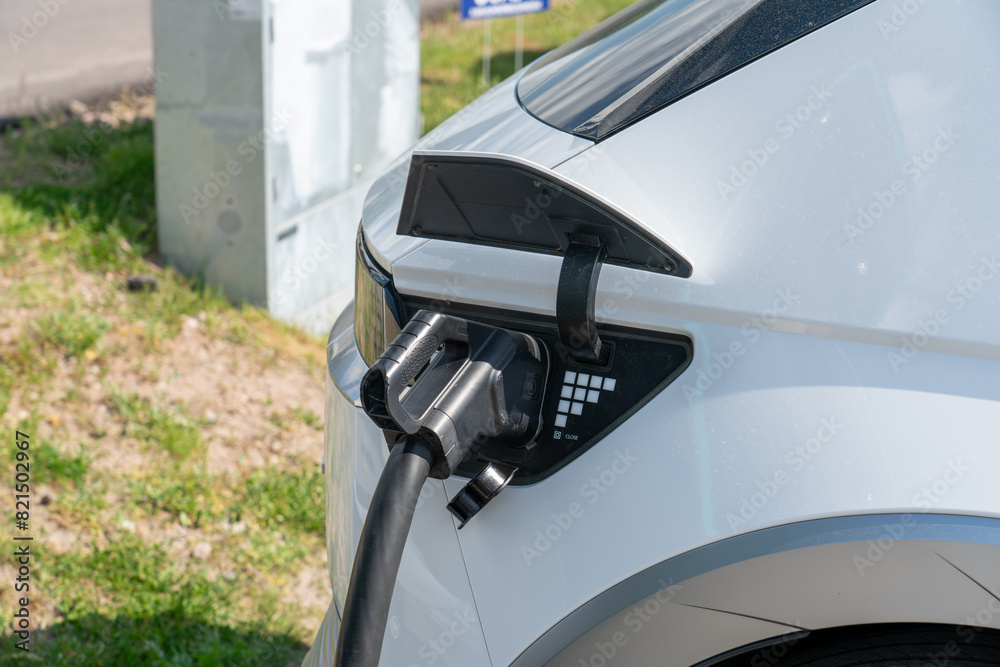 The Combined Charging System (CCS) connector charging electric vehicle ...