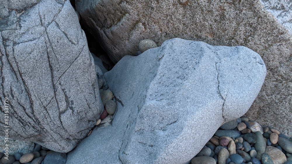 The Multi Cultural Rocks of Swamis Beach. Rounded and polished from ...