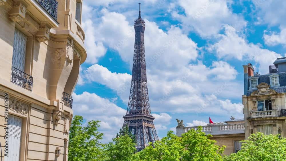 Romantic cozy view of the famous Eiffel tower from a small paris street ...