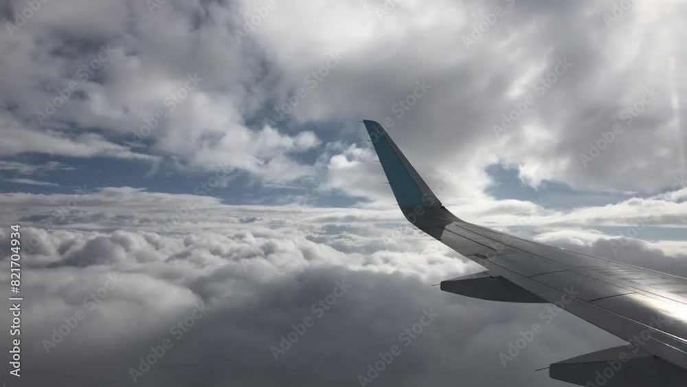 4K aerial photography of sea of clouds and airplane perspective Stock ...