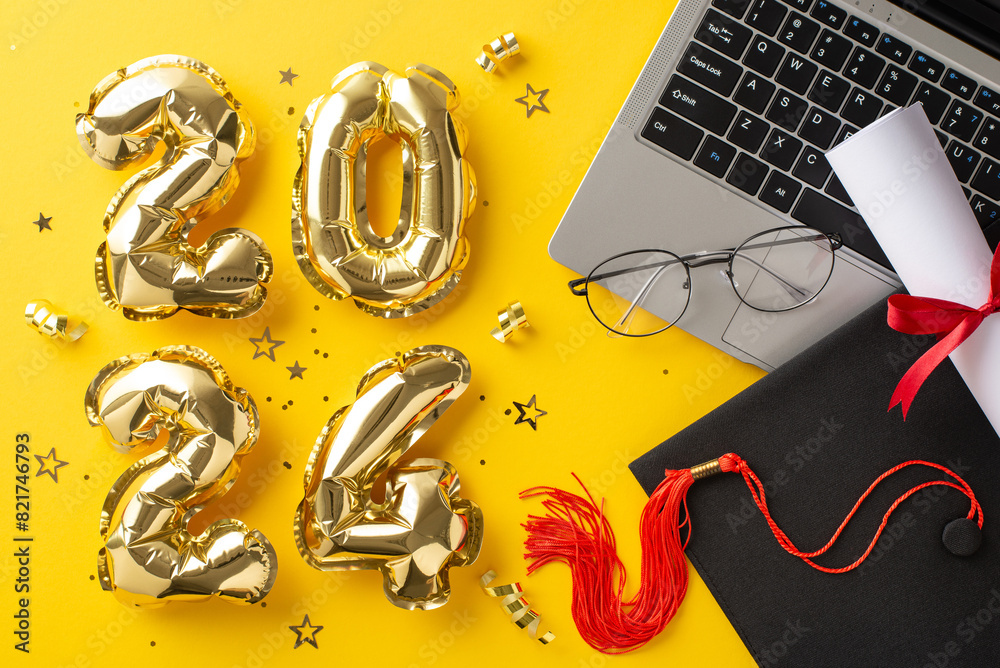 Virtual graduation celebration: Top view of laptop, cap, diploma ...