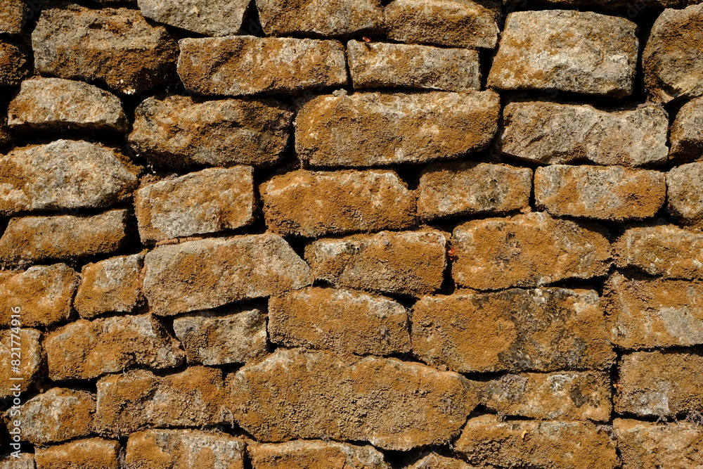 natural stone wall. box-shaped natural stone stacked into a natural ...