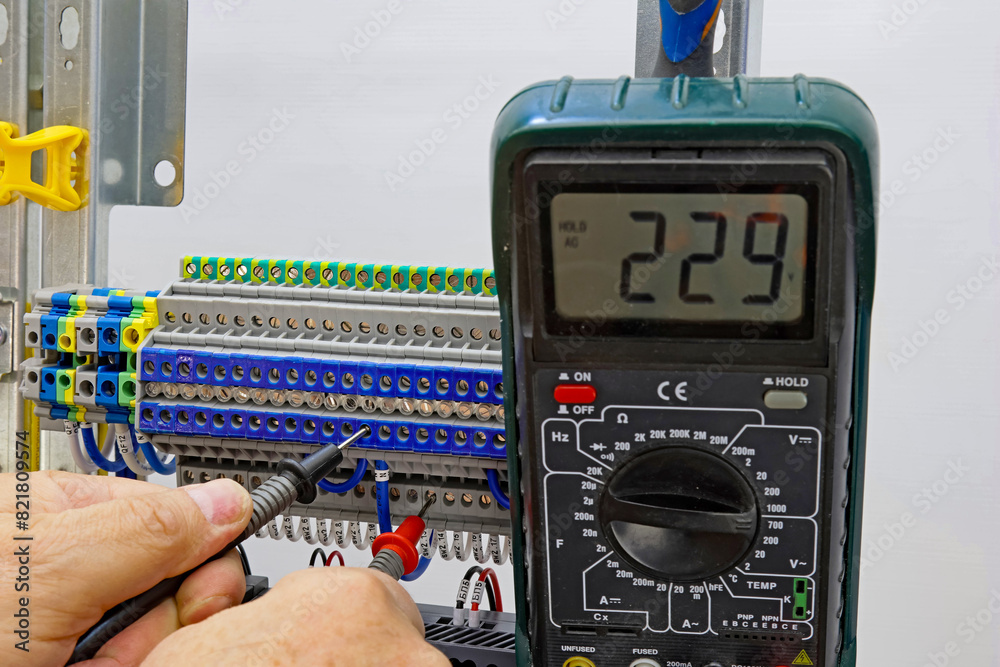 Measurement of electrical circuit parameters using a multimeter in an ...