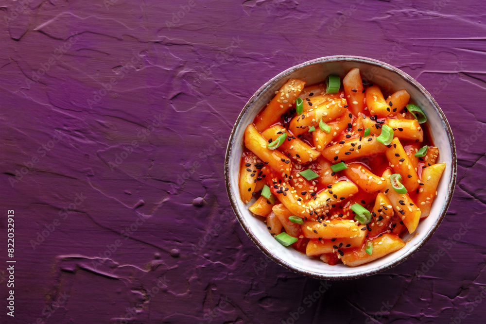 Tteokbokki or topokki, Korean street food, spicy rice cakes in red ...