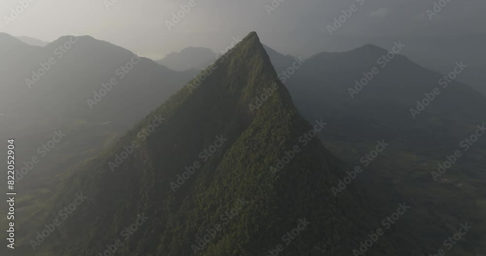 Aerial view of Cerro Tusa in misty clouds, Venecia, Antioquia, Colombia ...