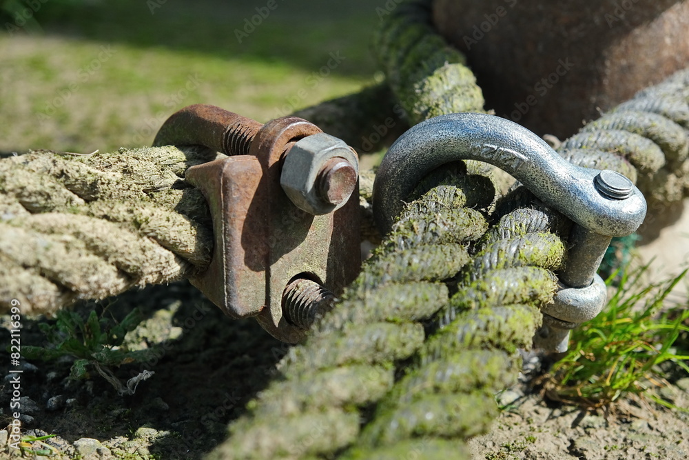 Screw pin anchor shackle and rope. Rusty rigging. Mooring of a ship ...