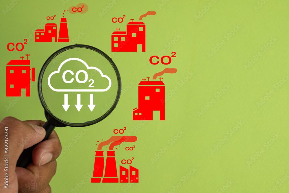 Magnifying Glass on Reduce CO2 Icon among Factory Icons for Climate Change Awareness,reducing ...