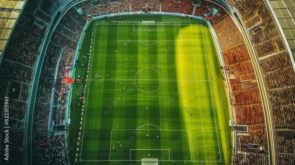 aerial view of a vibrant green soccer field in a packed stadium sports ...