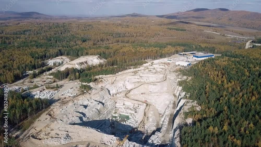 The big mine in the middle of the forest. The hills. Granite production ...