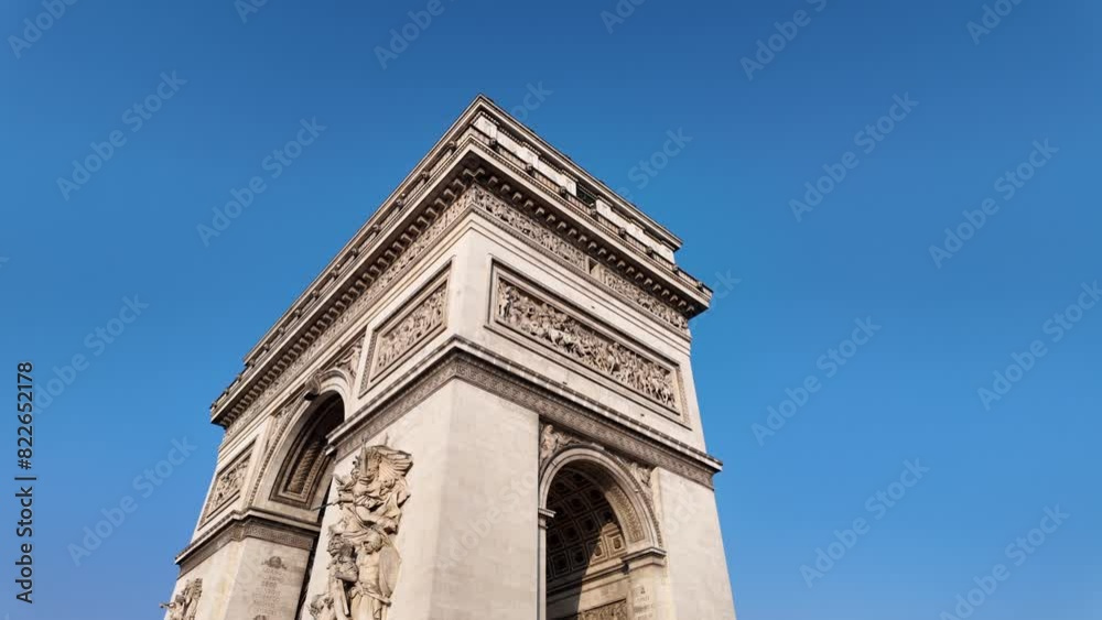 The Arc de Triomphe in Paris, captured at dawn from various angles ...