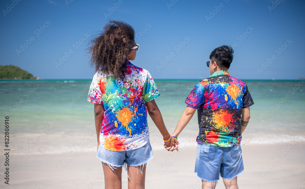 LGBTQ couple lover holding hand pose happiness life on beach in summer ...