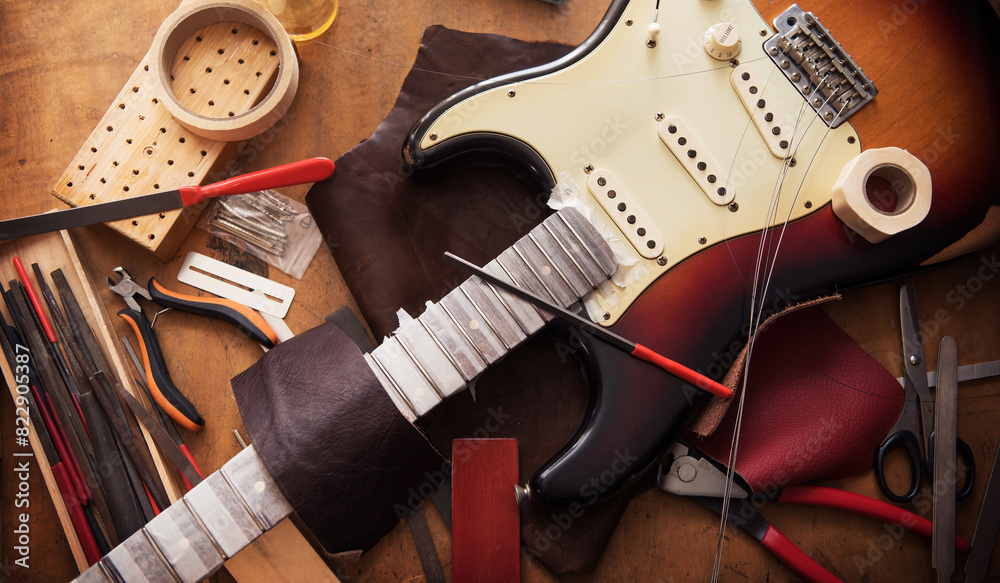 Electric guitar repair. Refretting an electric guitar. Electric guitar ...