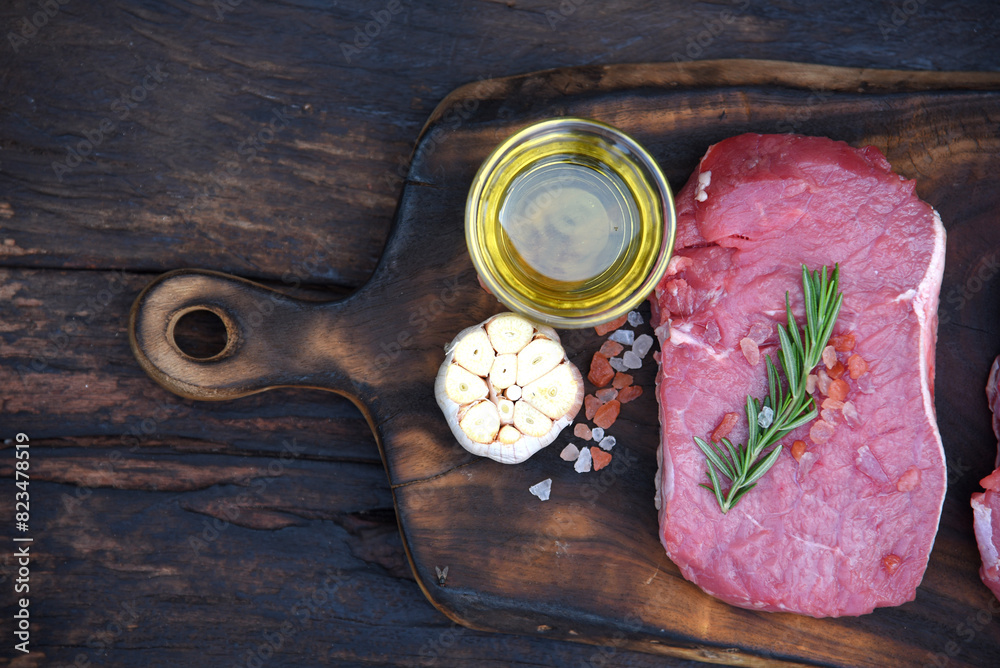 Top view raw beef tender meat steak grill pork barbeque on wooden board ...