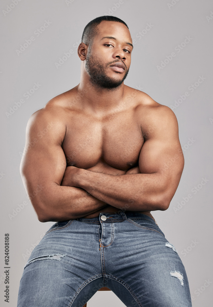 Portrait, body muscle and confident black man in studio for fitness ...