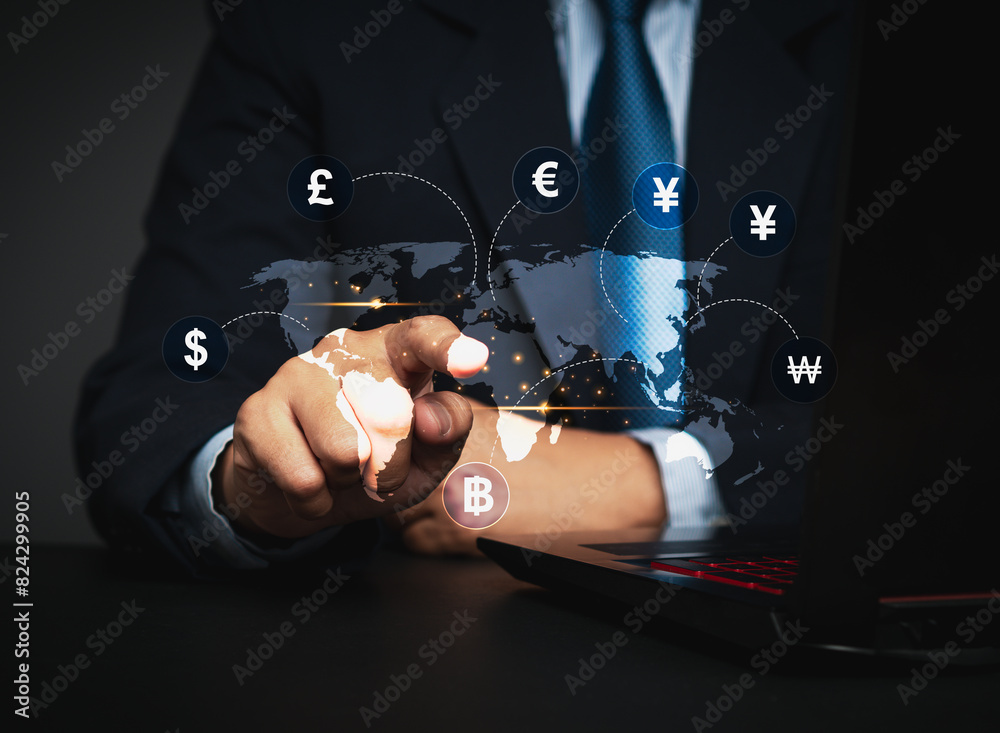 Businessman touches a world map and currency signs for technology ...