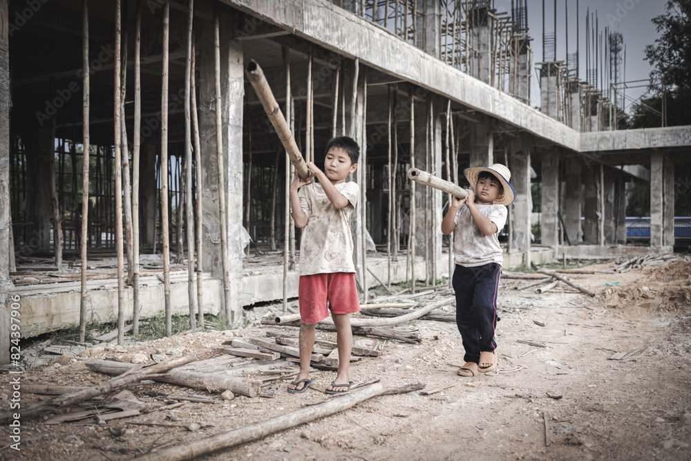 Two poor children are forced to work in construction. Poor children ...