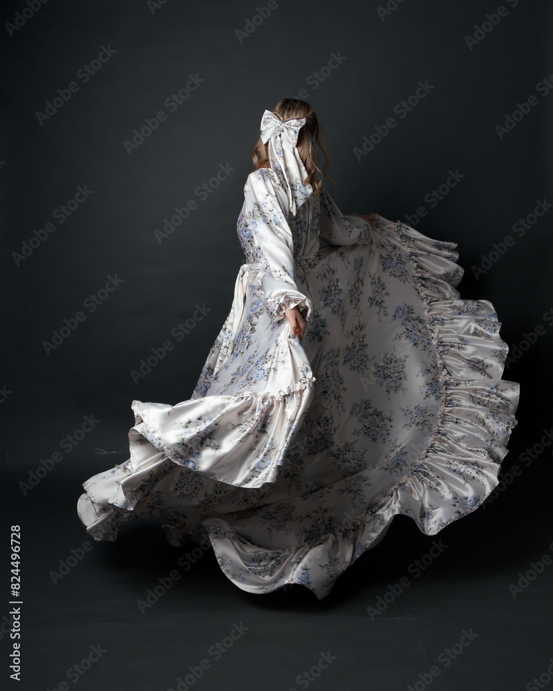 portrait of beautiful blonde female model wearing romantic historical ...