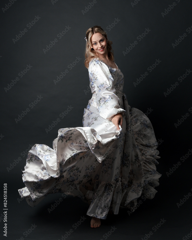 portrait of beautiful blonde female model wearing romantic historical ...