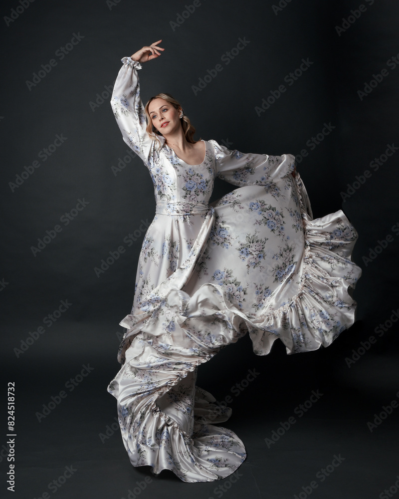 portrait of beautiful blonde female model wearing romantic historical ...