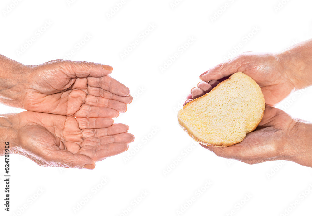 Hand with slice of whole wheat bread. Helping the homeless. Woman ...