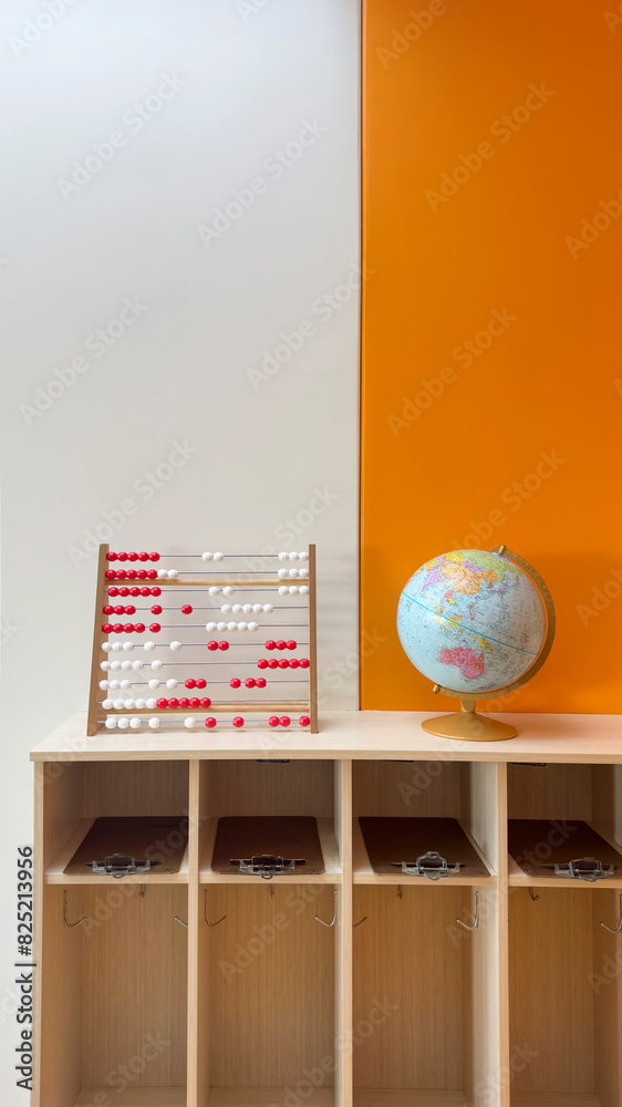 School classroom with abacus and globe Stock Photo | Adobe Stock