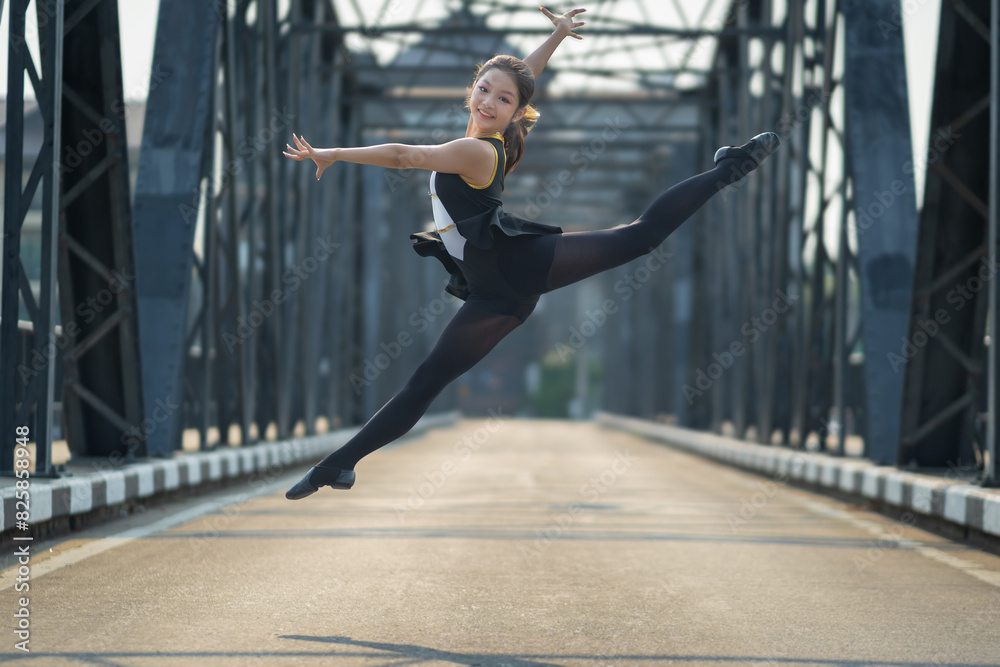 Beautiful girl ballerina dancing. Ballerina Performance Street Show in ...
