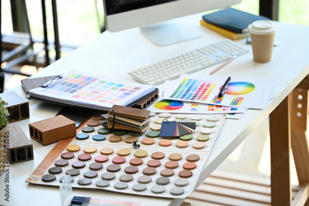 Interior designer working table with material sample and color swatches ...