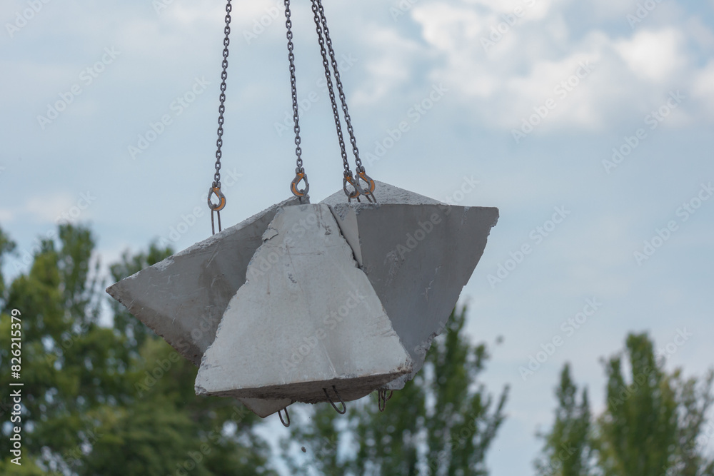 Loading and transporting dragon teeth for defense. Concrete pyramids ...