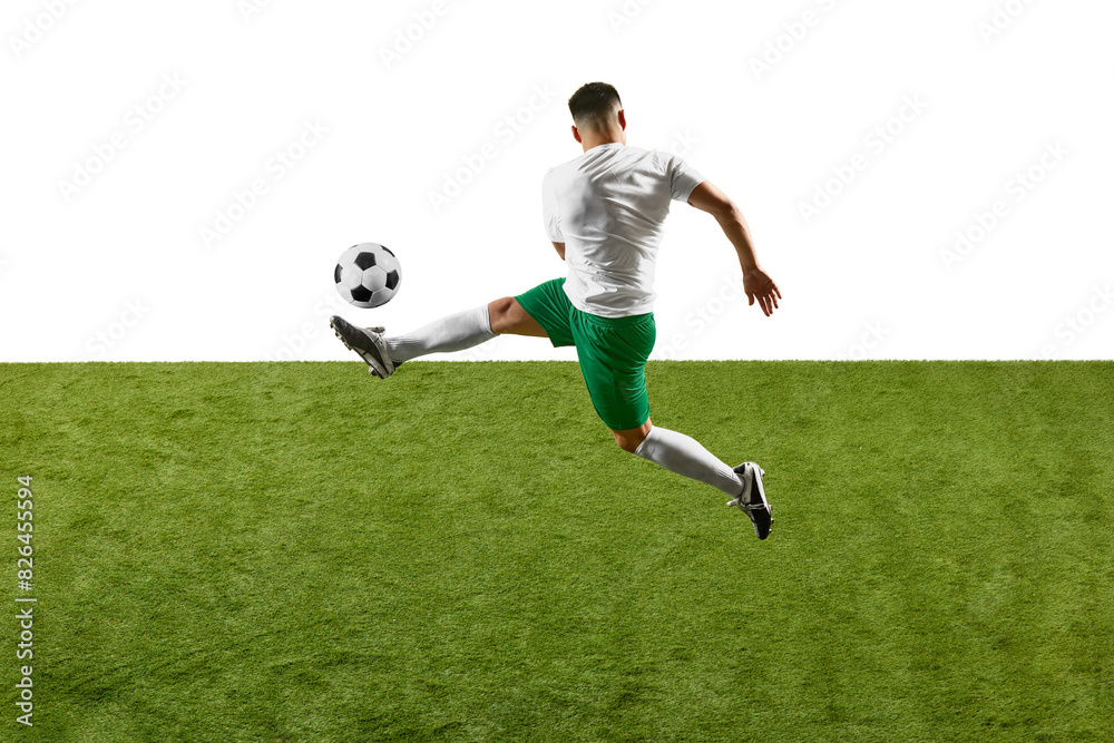 Dynamic photo of young athlete man, soccer player training to kicking ...