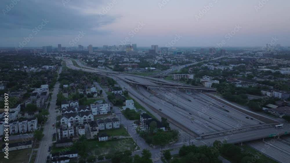 Lively Houston's busy highways at dusk from above, highlighting the ...