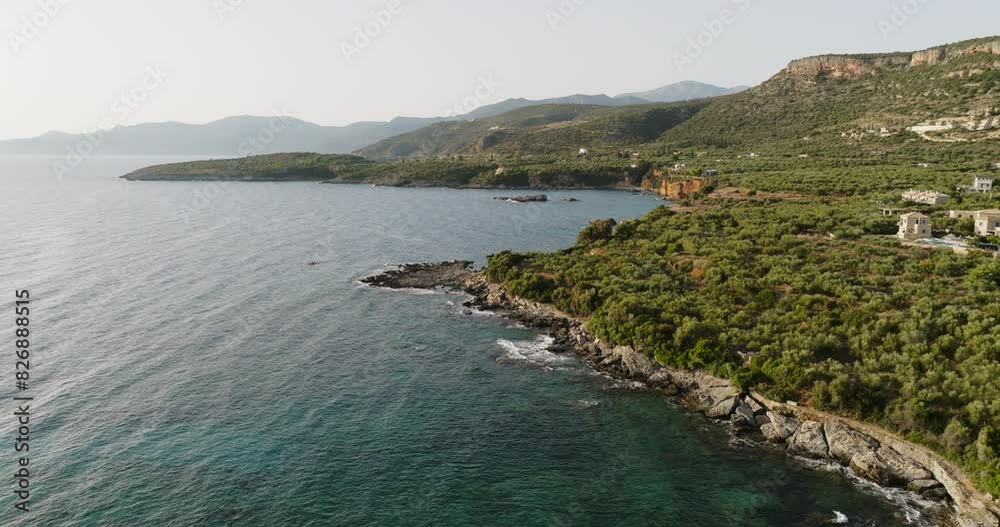 Capture of the stunning curved sandy shoreline and clear blue waters of ...