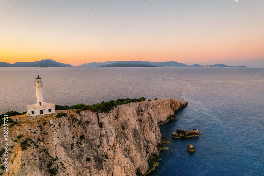Lighthouse on the cliff. Seascape of Cape Lefkatas with old lighthouse ...