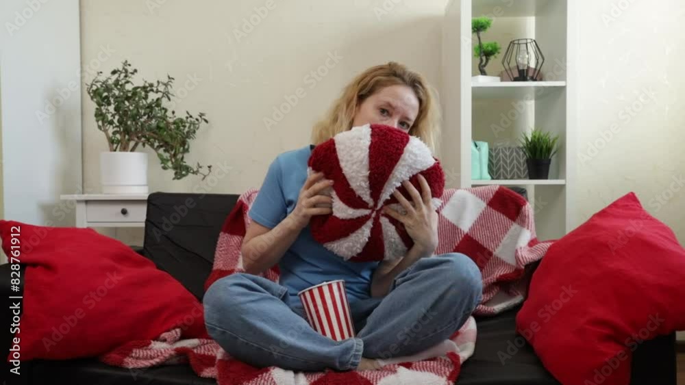 Scary movie, scared woman watching horror movie at home, fear and ...